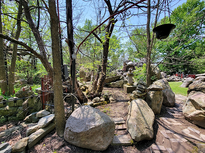 Winding pathways lead visitors through a labyrinth of carefully placed stones. Each turn reveals new surprises in this peaceful sanctuary.