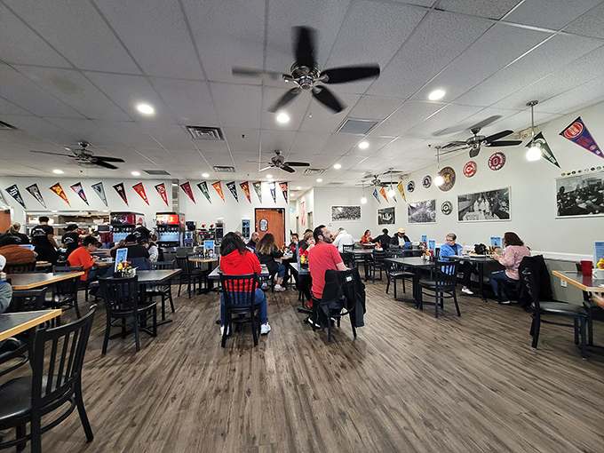 Sports pennants line the walls like trophies of comfort food victories. This isn't interior design&mdash;it's a declaration that you're among friends.