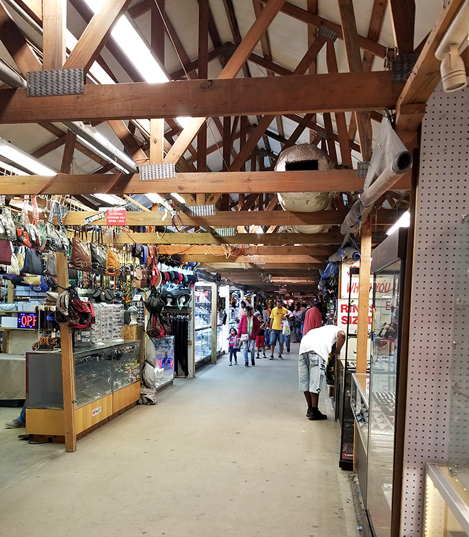 Follow the "MORE VENDORS" signs into a labyrinth of possibility. These wooden-beamed corridors have witnessed countless "I can't believe I found this!" moments over the years.