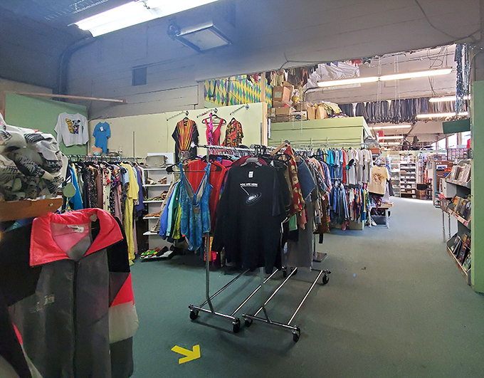 Racks upon racks of carefully curated clothing create a kaleidoscope of color and texture. The thrill of the hunt begins here.