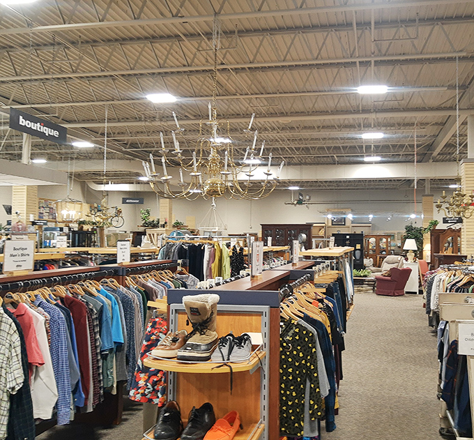 Beneath elegant chandeliers, racks of carefully curated clothing share space with furniture finds. The boutique section beckons with promises of designer labels at down-to-earth prices.