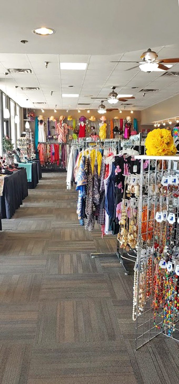 Color-coded clothing racks stretch toward retail nirvana. The organization here would make Marie Kondo weep tears of minimalist joy.
