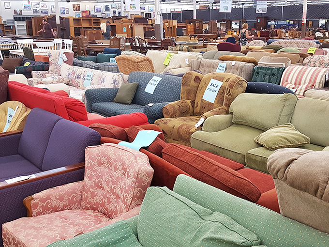 A sea of sofas stretches as far as the eye can see. It's like a living room showroom where every couch has a story and your perfect match awaits.