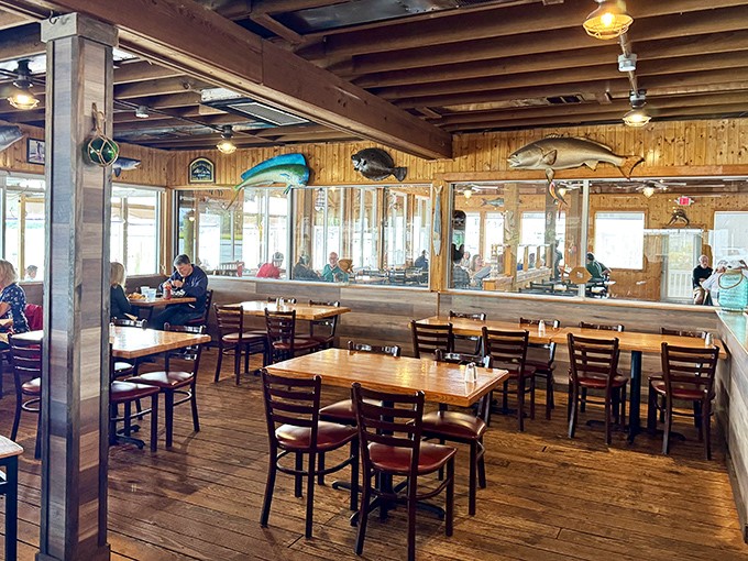 Wooden beams, mounted fish, and tables spaced just right – the dining room feels like the world's most comfortable fishing cabin.