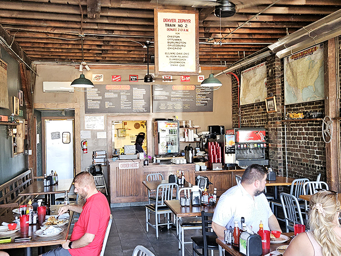 Inside, time slows down. Exposed brick, wooden beams, and the gentle hum of conversation create that rare atmosphere where calories don't count.