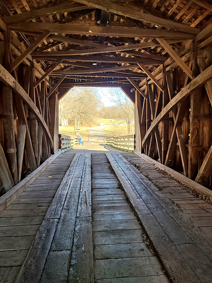 Step inside and you're walking through a wooden cathedral of craftsmanship, where sunlight plays hide-and-seek between massive timber beams.