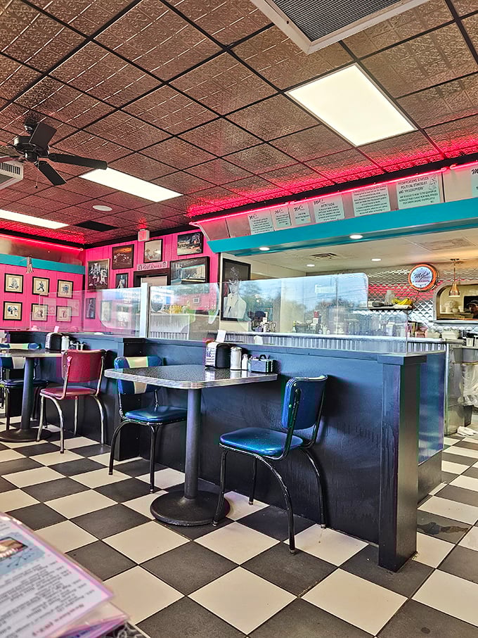 Pink walls, turquoise trim, and chrome accents—this isn't just a diner, it's a time machine that serves coffee.