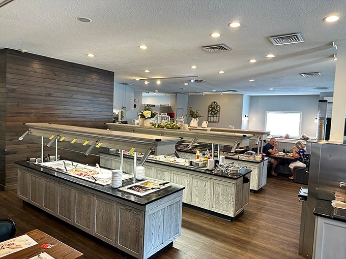 Buffet stations gleam with promise, arranged with the precision of a NASA launch sequence but with considerably more gravy.