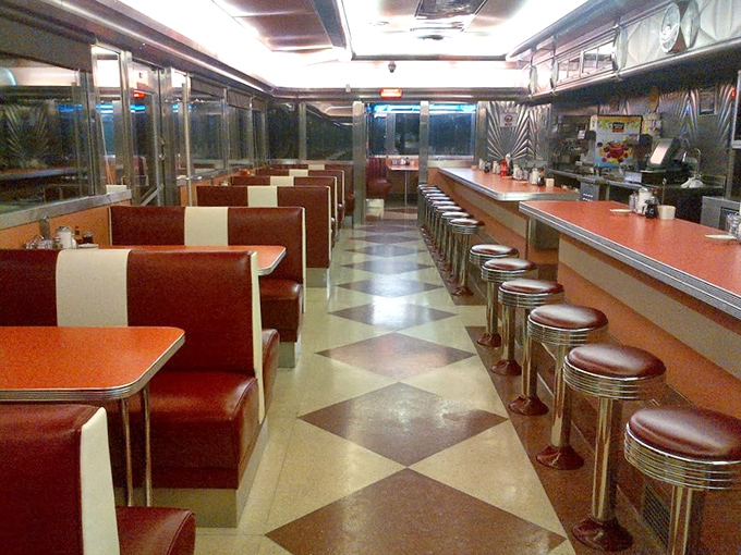 Step inside and time-travel to the golden age of diners&mdash;red vinyl booths, chrome accents, and a counter where stories are shared over steaming coffee cups.