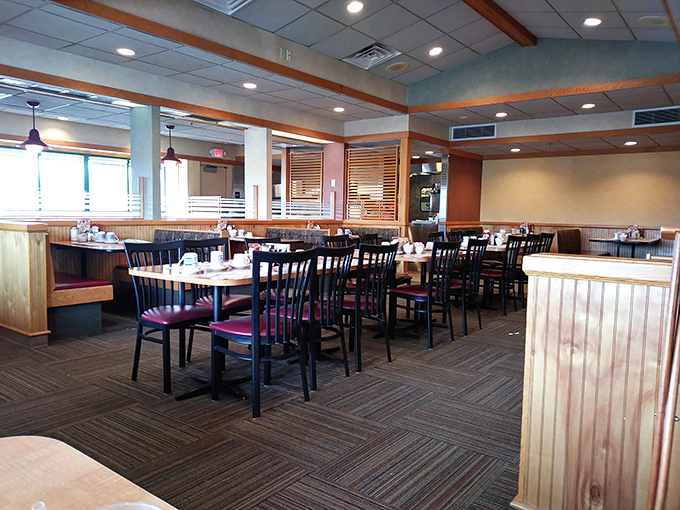 Classic diner ambiance meets modern comfort in this thoughtfully designed dining room where conversations flow as freely as the coffee.