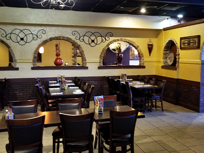 Step inside to discover warm yellow walls and decorative arches that transport you straight to Mexico's heart.