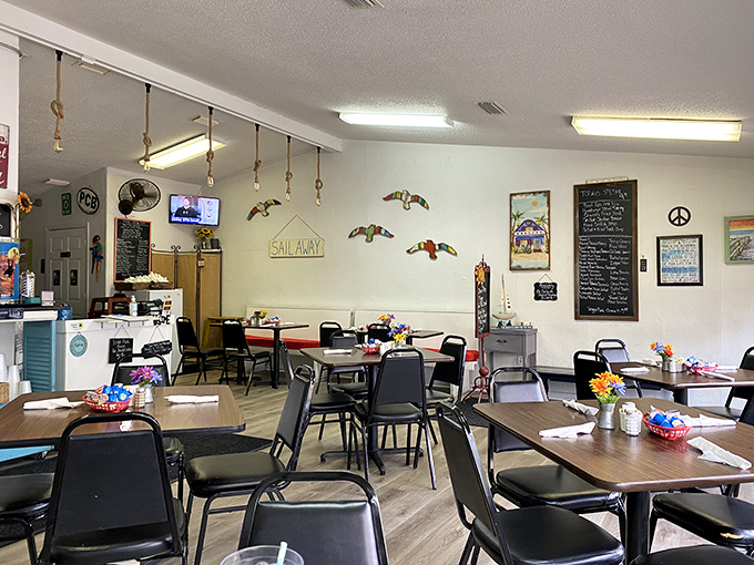 Simple tables, wooden seagulls, and a "SAIL AWAY" sign create the unpretentious charm that's increasingly rare in our Instagram-obsessed culinary world. No filters needed here.