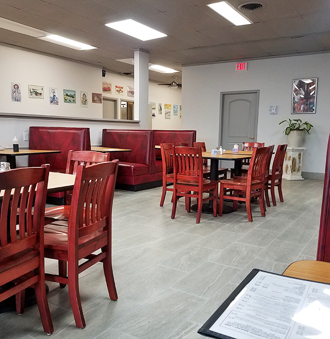 Red vinyl booths and wooden chairs create that perfect "come as you are" atmosphere where breakfast dreams come true without pretension.
