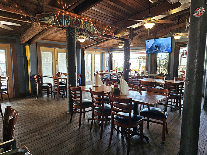 "Step inside to a dining room where wooden beams and nautical charm create the perfect backdrop for seafood feasts and waterfront views."