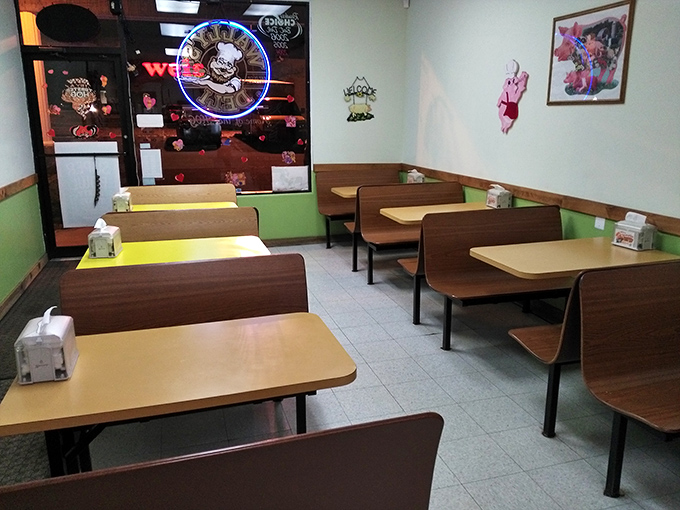 Simple booths, mint-green walls, and zero pretension &ndash; Wally's interior tells you they're focusing on what matters: sandwich perfection, not fancy decor.