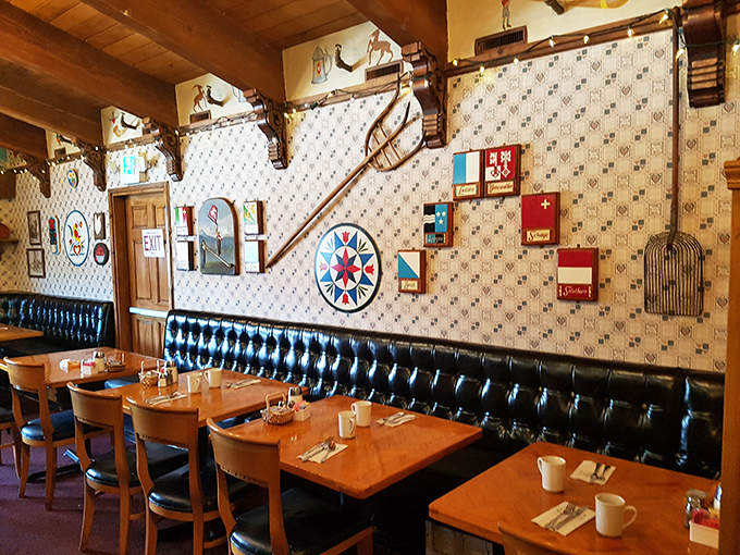 Cozy Alpine charm meets breakfast comfort. The blue leather booths and wooden accents create the perfect mountain hideaway for pancake enthusiasts.