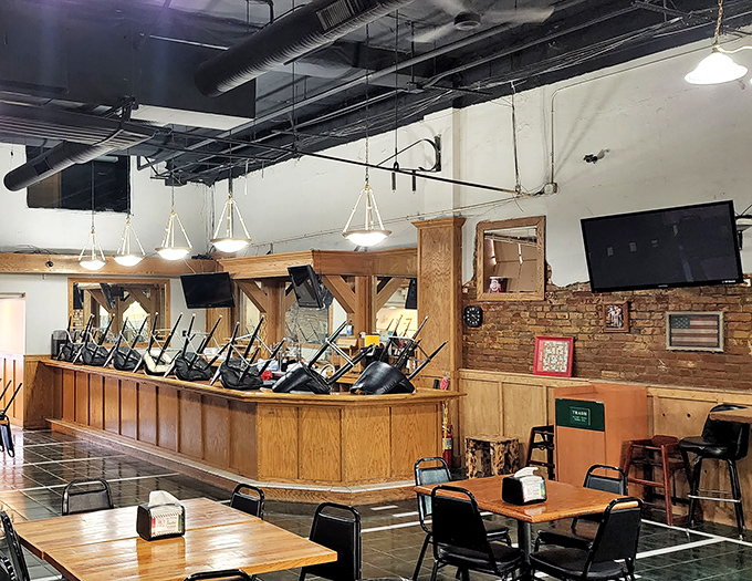 Where pizza magic happens! The wooden counter has witnessed more delicious transactions than Wall Street, minus the complicated paperwork.