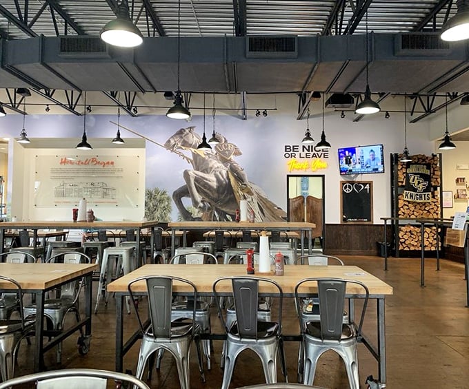 Industrial-chic meets Southern hospitality inside, where the "BE NICE OR LEAVE" sign isn't just decor&mdash;it's a philosophy rendered unnecessary by the first bite.