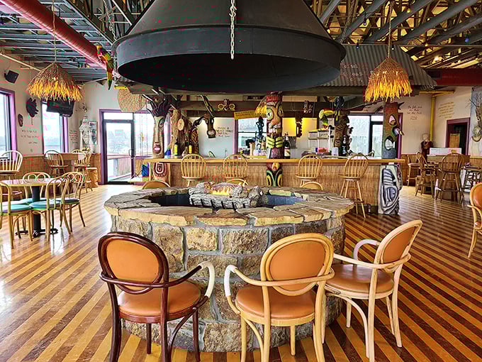 Step inside and you're transported to a coastal fantasy with thatched lamps and a stone fire pit. It's like a tiki bar and New England fish house had a beautiful baby.