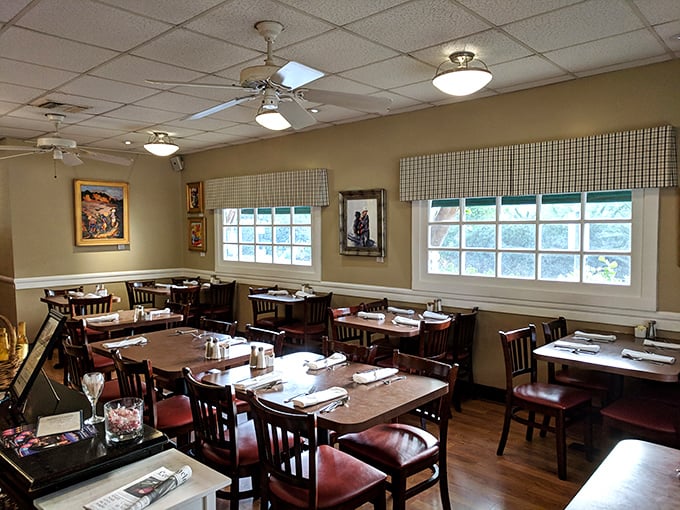 Inside, warm wood tables and checkered window treatments create that "grandma's dining room" vibe, minus the plastic-covered furniture and awkward family questions.