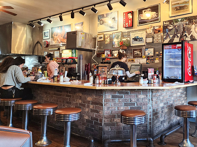 Where diner magic happens: The horseshoe counter at Beechwold is command central for coffee refills, neighborhood gossip, and the symphony of sizzling breakfast.