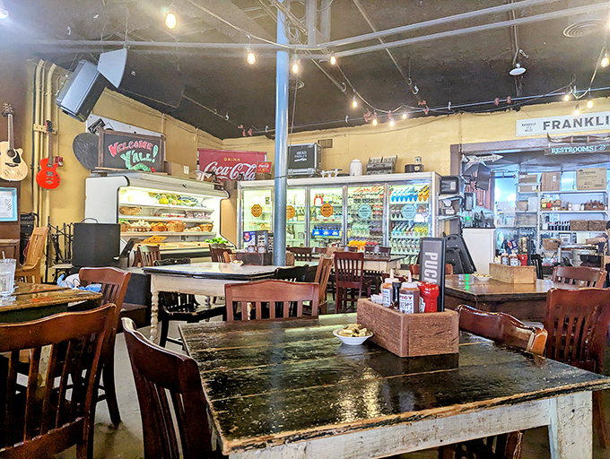 Step inside and time slows down &ndash; wooden tables bearing the patina of countless meals, vintage signs, and refrigerator cases that whisper of Puckett's grocery store origins.