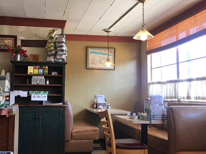 Cozy booths where countless coffee cups have been refilled and life stories exchanged. The wood paneling isn't retro&mdash;it's authentically unchanged.