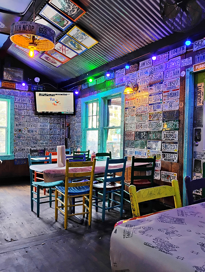 License plates from across America create a road-trip tapestry on the walls. Each one tells a story; together they're burger joint poetry.