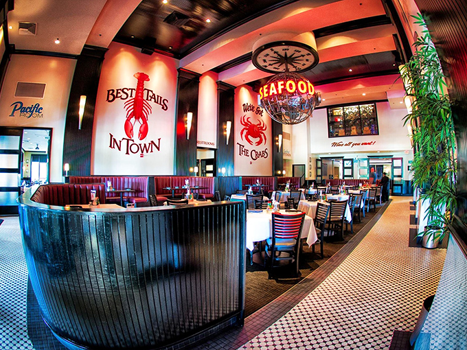 Bold red walls proclaiming "Best Tails in Town" set the stage for seafood theater where the ocean's finest performers take center stage. 