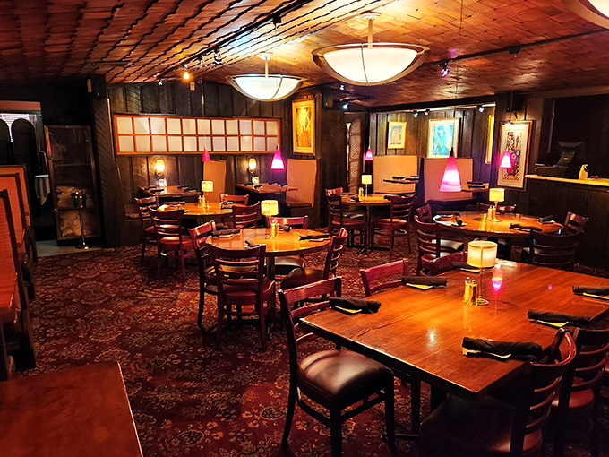 Warm lighting and rich wood create the perfect backdrop for serious conversations about even more serious steaks.