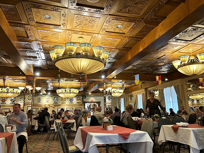 Beneath ornate wooden ceiling panels and elegant chandeliers, generations of diners have created memories one schnitzel at a time.