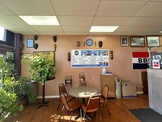 Inside, potted plants and simple decor create that "grandma's living room meets smoke shack" vibe that somehow makes the barbecue taste even better.