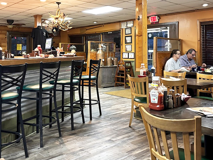 Rustic wooden beams and that antler chandelier tell you immediately: this isn't some big-city pretender, but the real mountain deal.