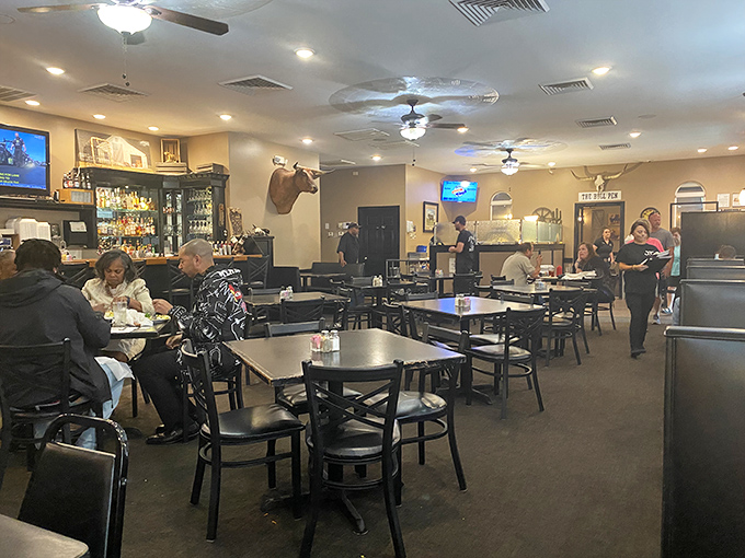 Inside Johnny Bull's, the comfortable dining room strikes that perfect balance between casual and special occasion, where conversations flow as freely as the sweet tea.