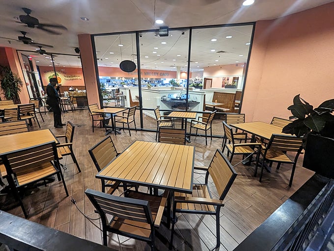 A glimpse into Peach Valley's inviting interior, where comfortable seating and warm lighting create the perfect backdrop for morning conversations and coffee refills.