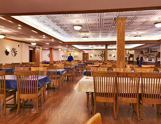 Handcrafted wooden tables and chairs fill a dining room where conversations flow as freely as the gravy &ndash; no screens necessary.