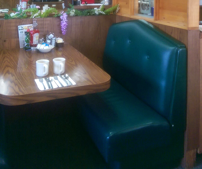 Classic forest green vinyl booths await, where countless elbows have rested and countless stories have been shared over steaming coffee cups.