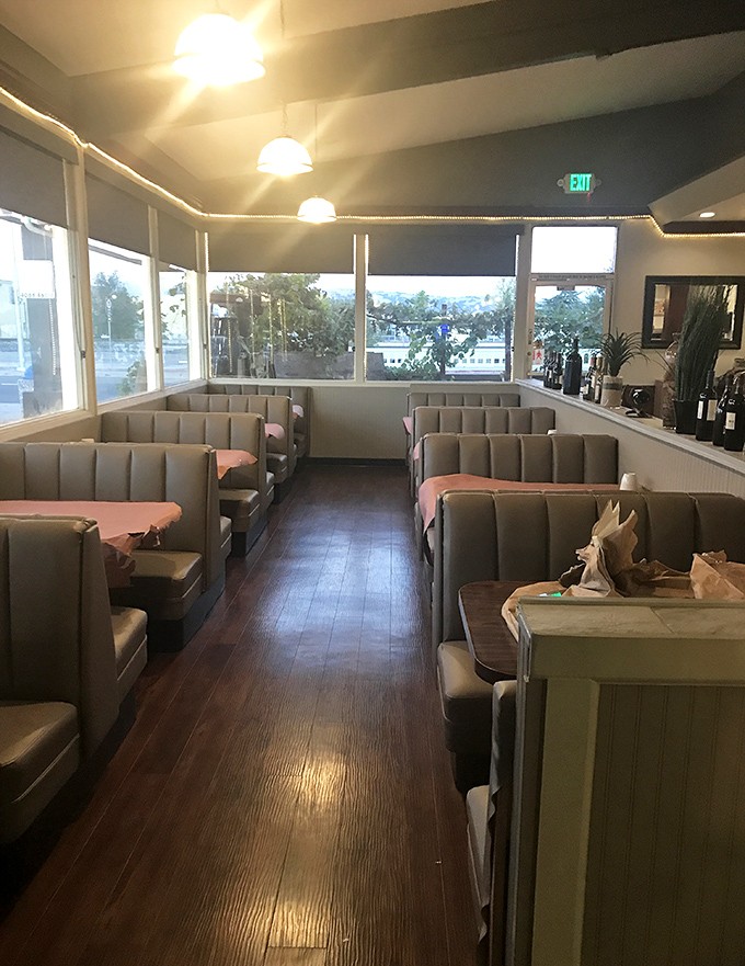 Classic diner booths invite you to slide in and stay awhile. The kind of comfortable seating that says, "Order dessert, we're not rushing you."