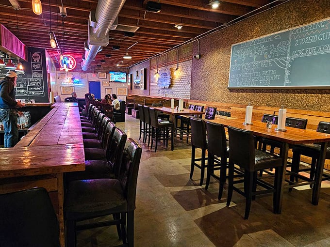 Where meat magic happens. The rustic interior with exposed brick and wooden tables says, "We're not here for the d&eacute;cor&mdash;we're here for the brisket."