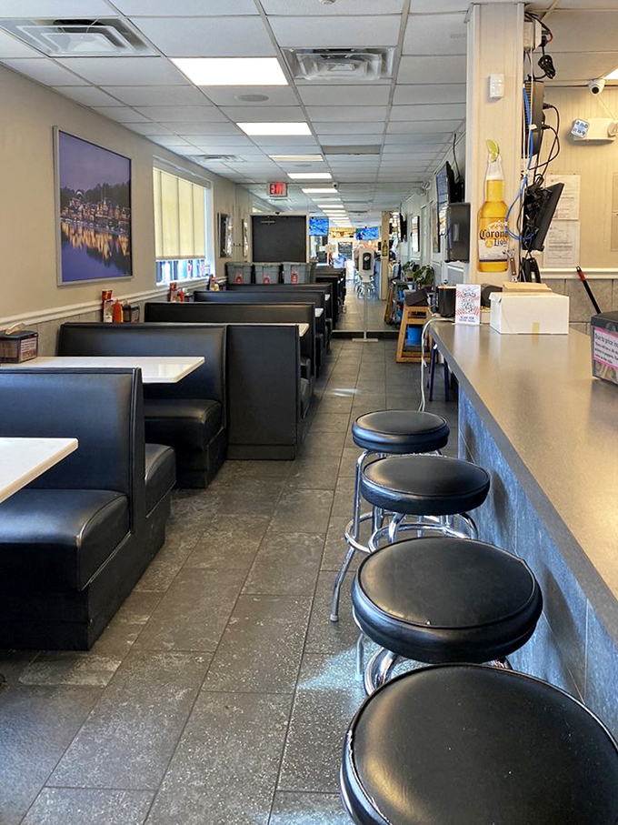 Step inside and time stands still. Black vinyl booths, counter seating, and that unmistakable aroma of sizzling beef &ndash; this is Philadelphia's temple of sandwich worship.