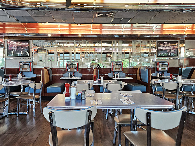 Classic chrome and vinyl booths create the perfect backdrop for memorable meals and meaningful conversations with fellow food lovers.
