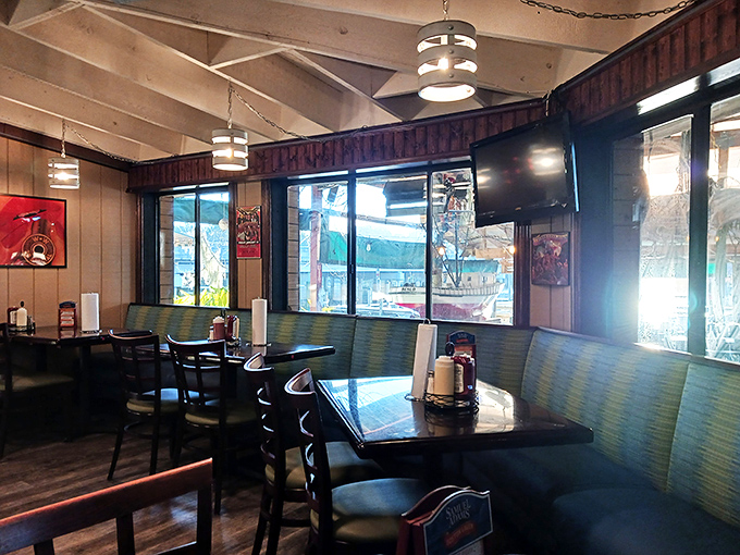 Cozy booths and nautical vibes create the perfect backdrop for seafood stories that grow taller with each sweet tea refill.