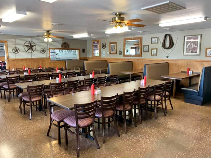 Wood paneling, ceiling fans, and metal stars create that quintessential "grandma's dining room" vibe where calories don't count and memories are made.