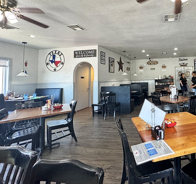 Inside, Texas pride meets diner comfort. The state emblem on the wall practically guarantees your eggs will arrive with an accent.