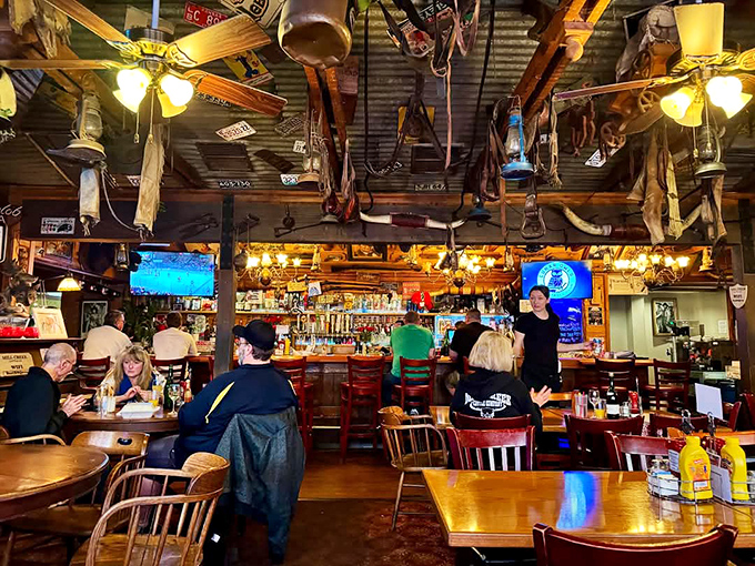 The interior feels like the saloon where the good guys would celebrate after saving the town, with authentic Western memorabilia dangling from every beam.