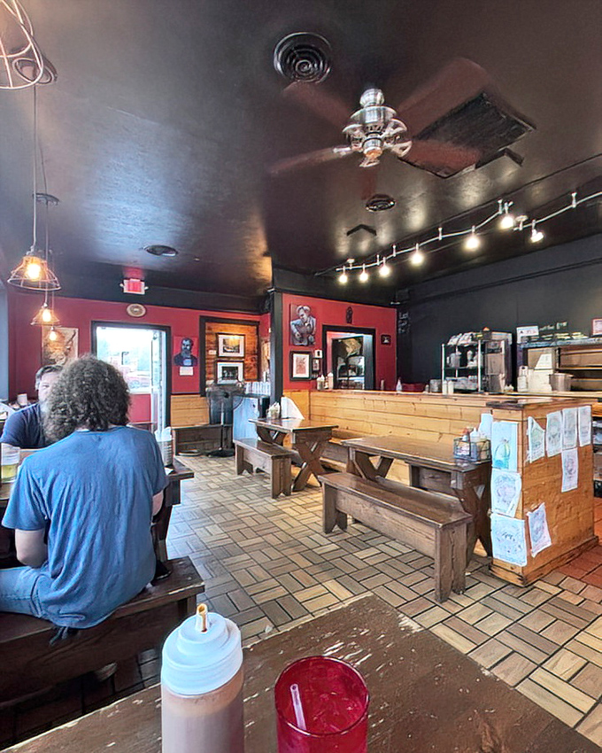 Inside, rustic wooden benches and red walls create the perfect no-frills setting where the food rightfully becomes the star of the show.
