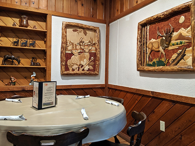 The rustic interior features wildlife artwork that watches over diners like benevolent forest spirits guarding the sacred ritual of comfort food consumption.