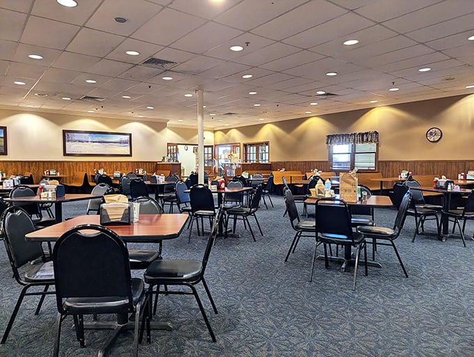 Sunlight streams through the windows of this unpretentious dining room, where conversations flow as freely as the coffee refills.