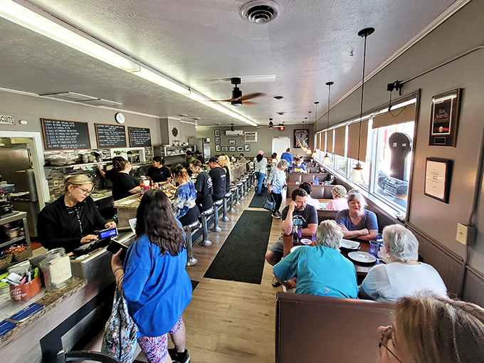 The counter seating at Five Points is prime breakfast real estate, where regulars and newcomers alike witness the morning symphony of sizzling skillets and friendly banter.