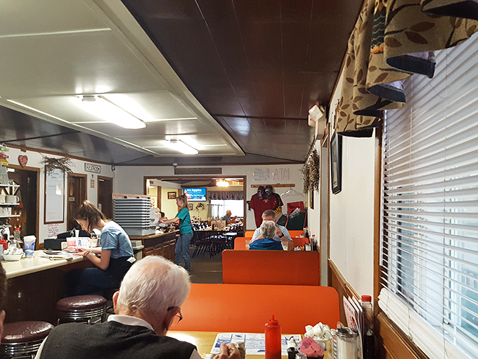 Step inside and discover why orange vinyl booths and fluorescent lighting create the perfect recipe for comfort.